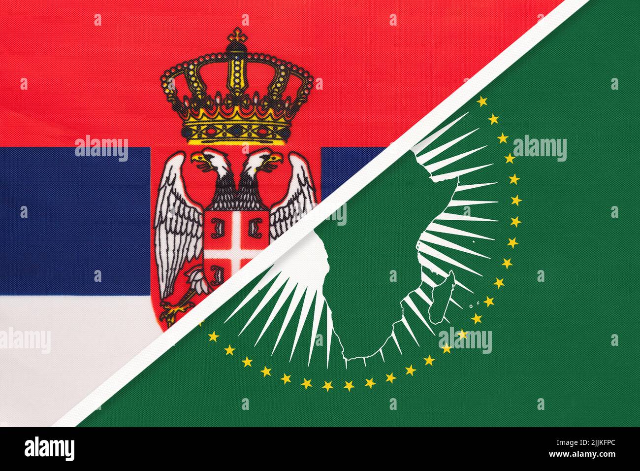 African Union and Serbia, national flag from textile. Africa continent ...