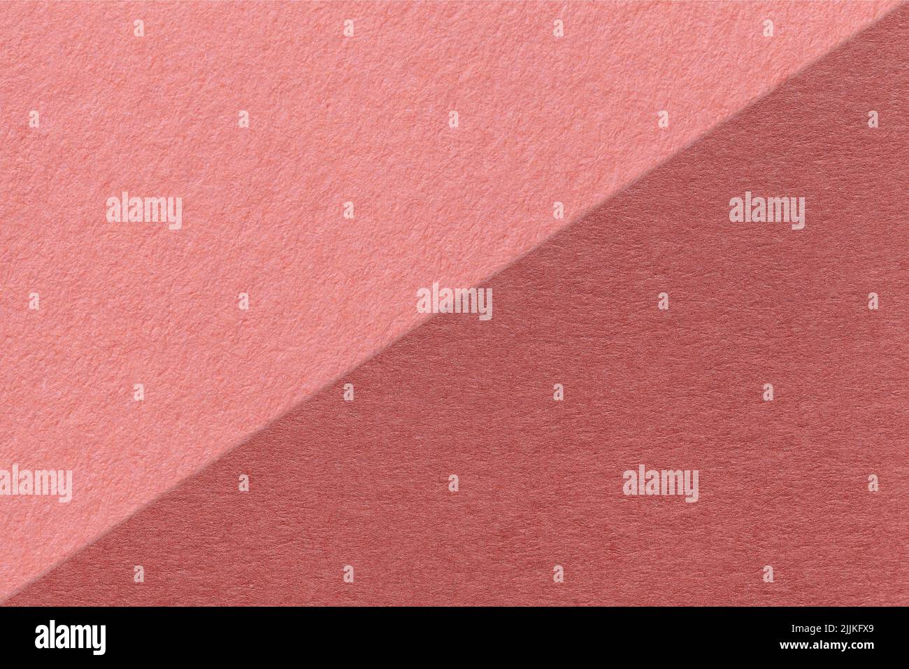 Texture of craft maroon and rose paper background, half two colors ...