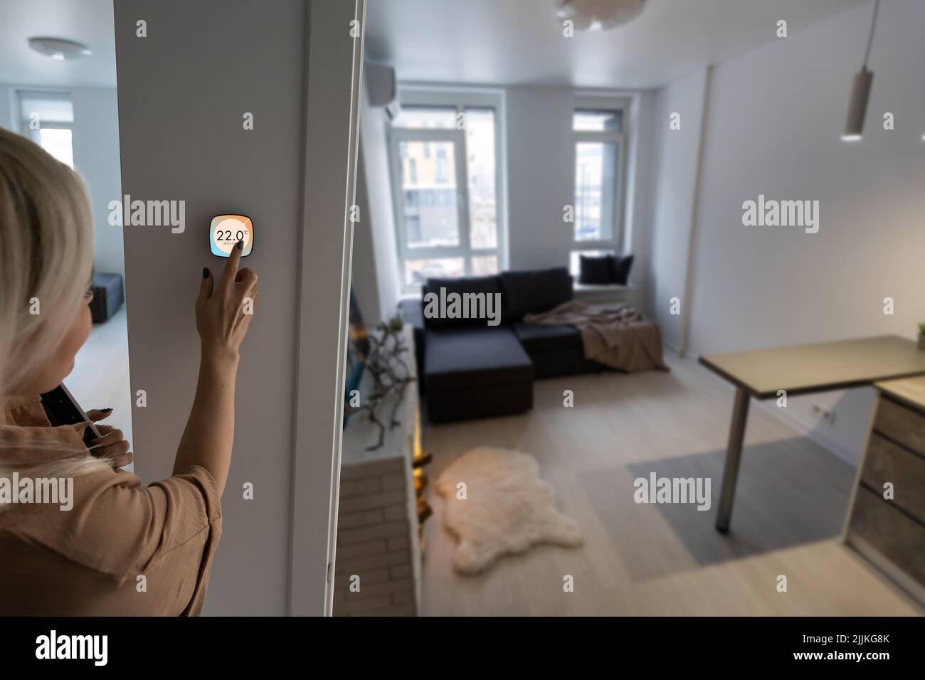 Thermostat smart home domotic control panel on wall for winter house ...