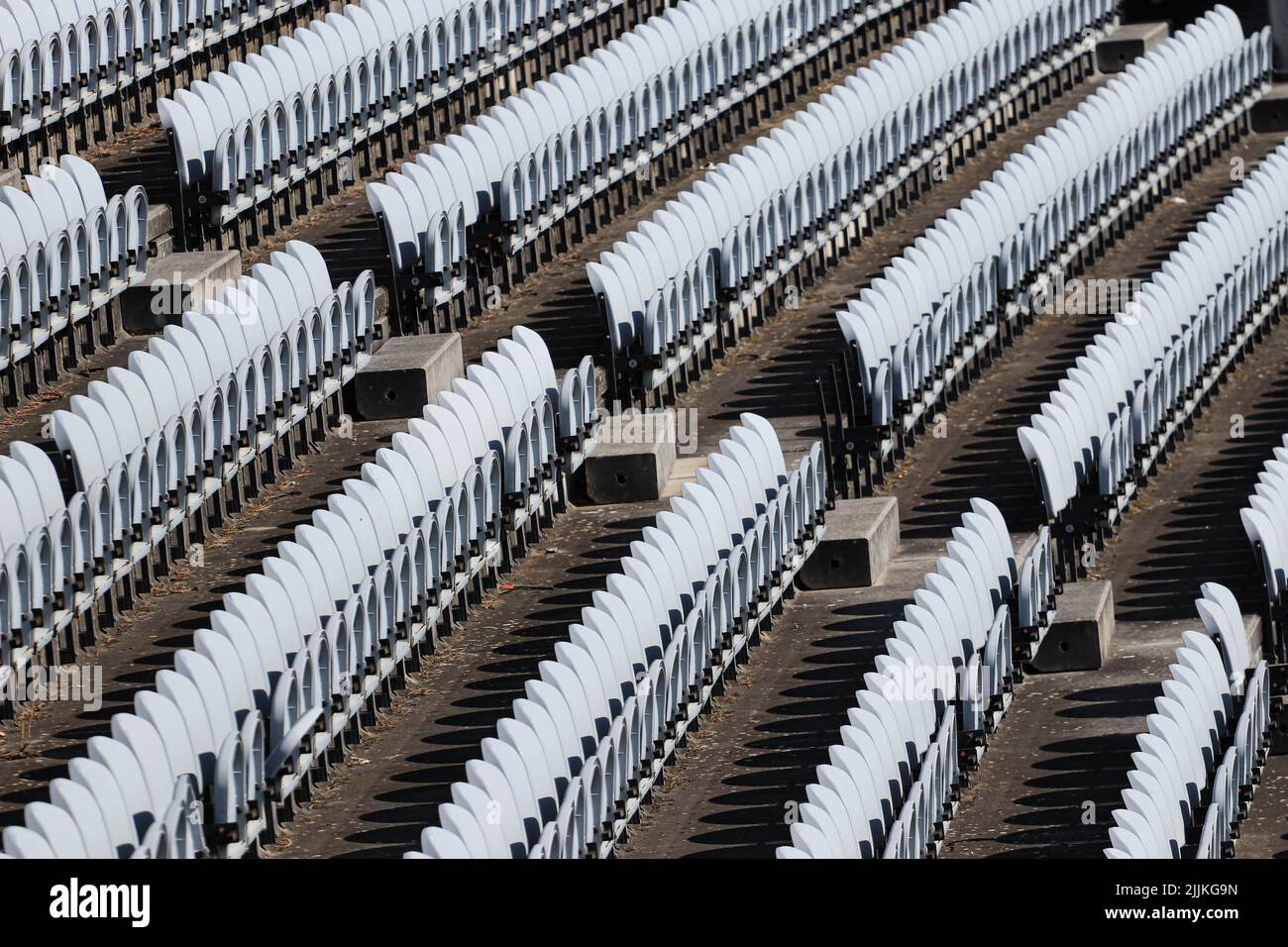 An aerial view of empty seats in stadium on a sunny day Stock Photo - Alamy