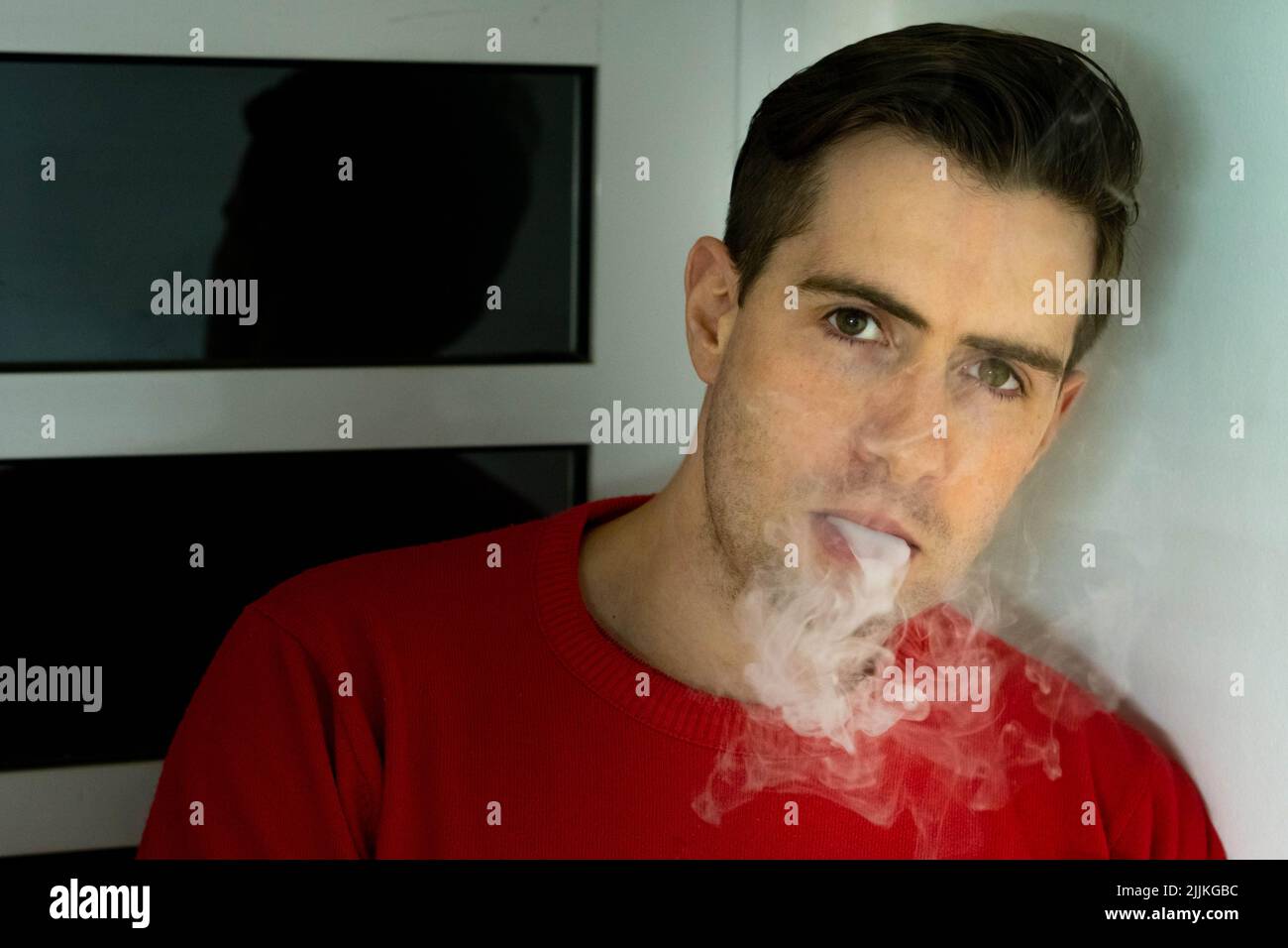 Pose smoking smoke hi-res stock photography and images - Alamy