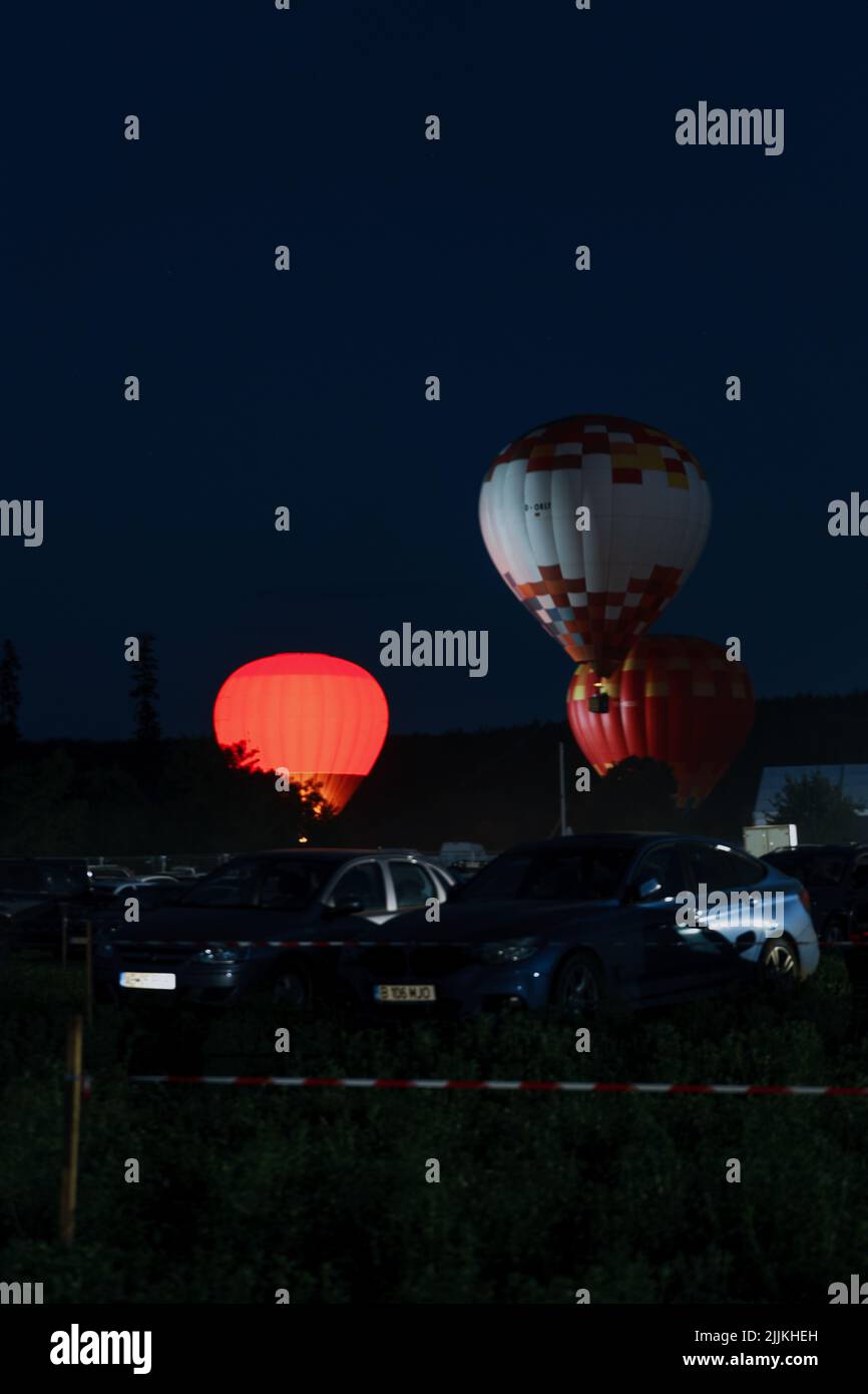 Flying color balloons night sky hi-res stock photography and images - Alamy