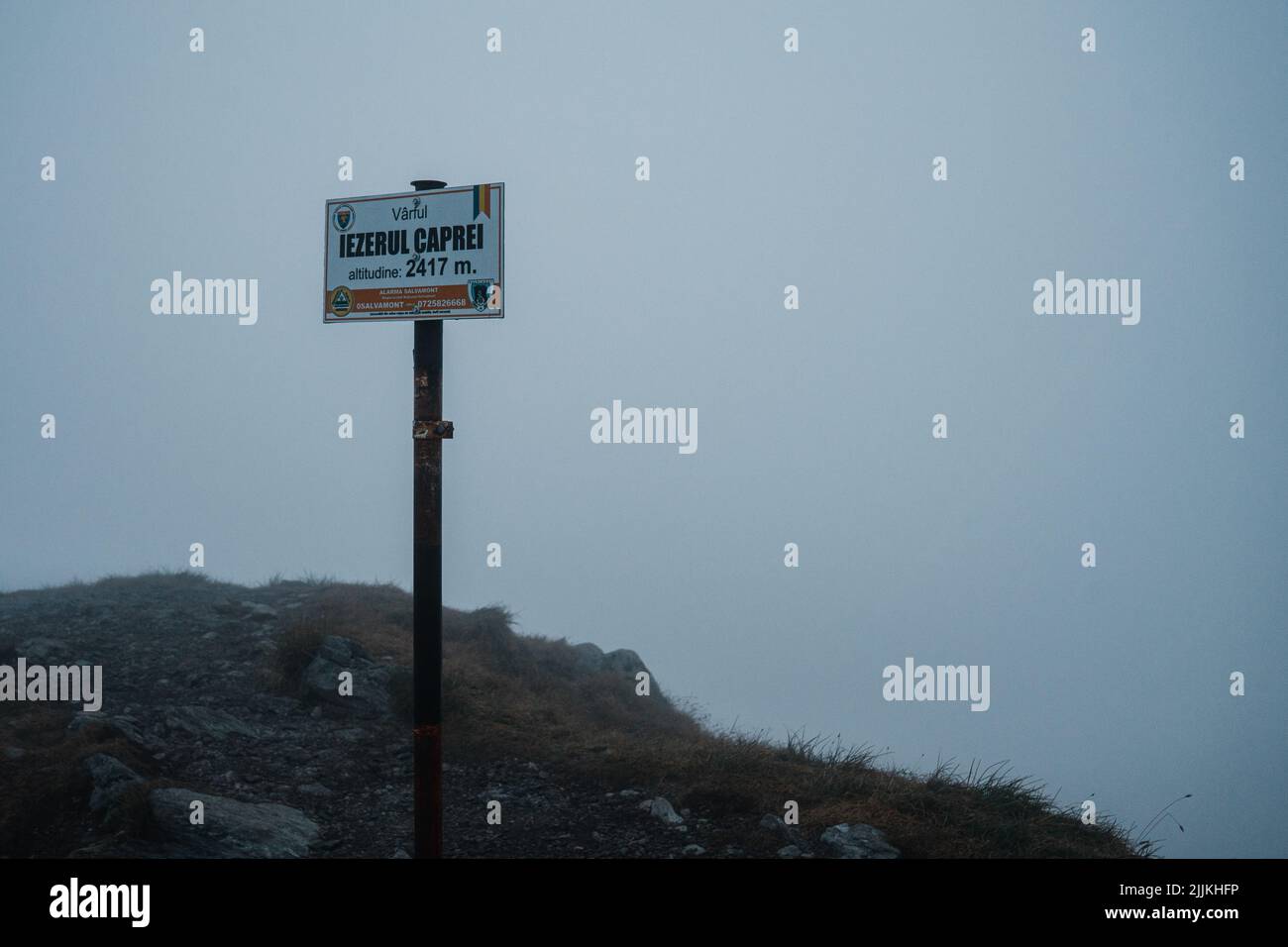 A mountain sign that indicates a peak of 2417 meters Stock Photo - Alamy