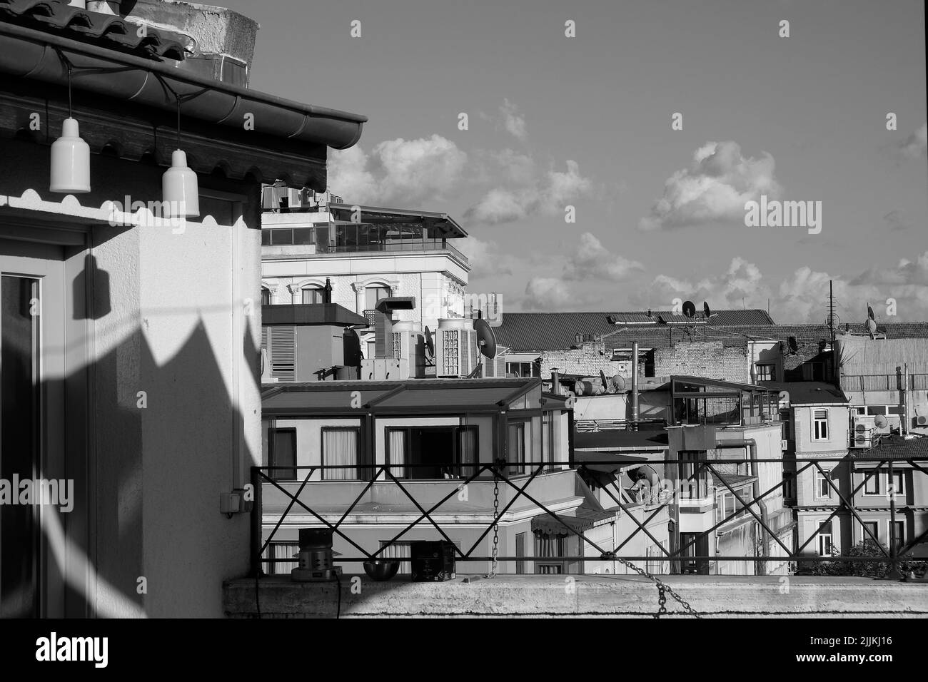 A greyscale shot of buildings in the city Stock Photo - Alamy