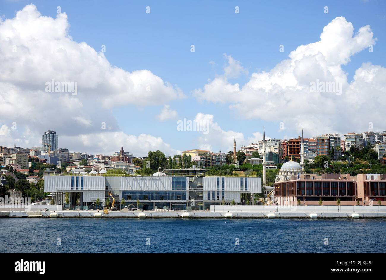 A distant view of the cityscape with sea in the foreground in Istanbul ...
