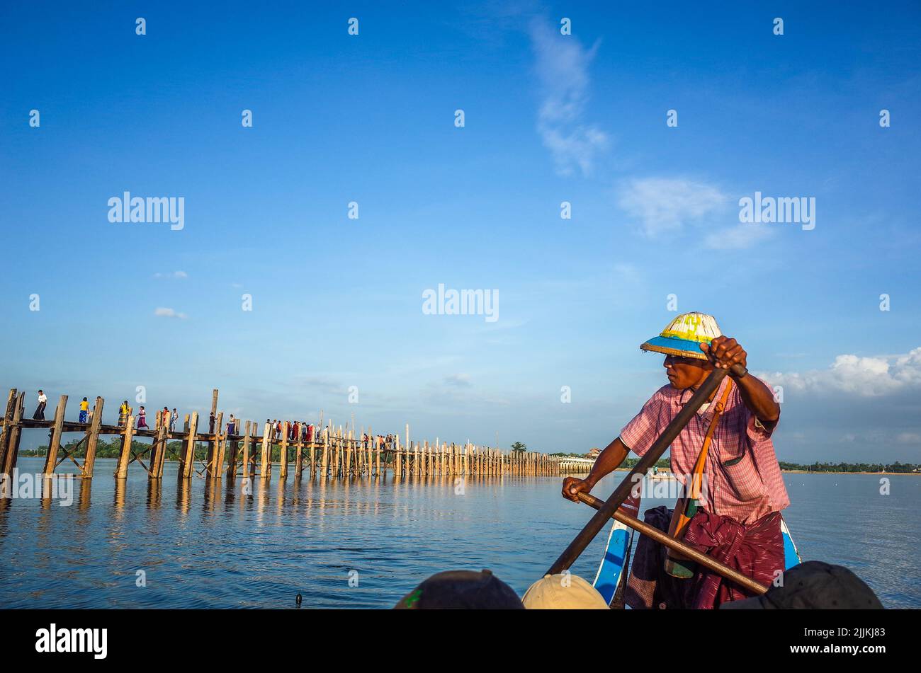 photo of man in boat in Myanmar travel lake Stock Photo - Alamy