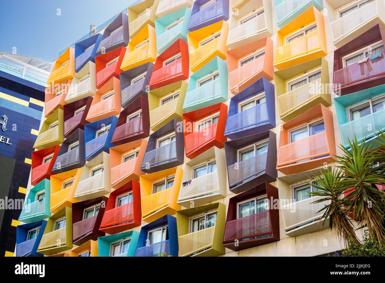 A low angle shot of the colorful facade of Holiday Inn Express in Malta ...
