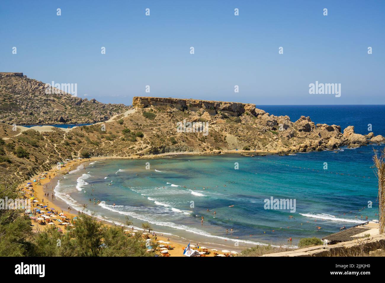 An aerial shot of the beautiful Riviera Beach in Malta under a clear ...