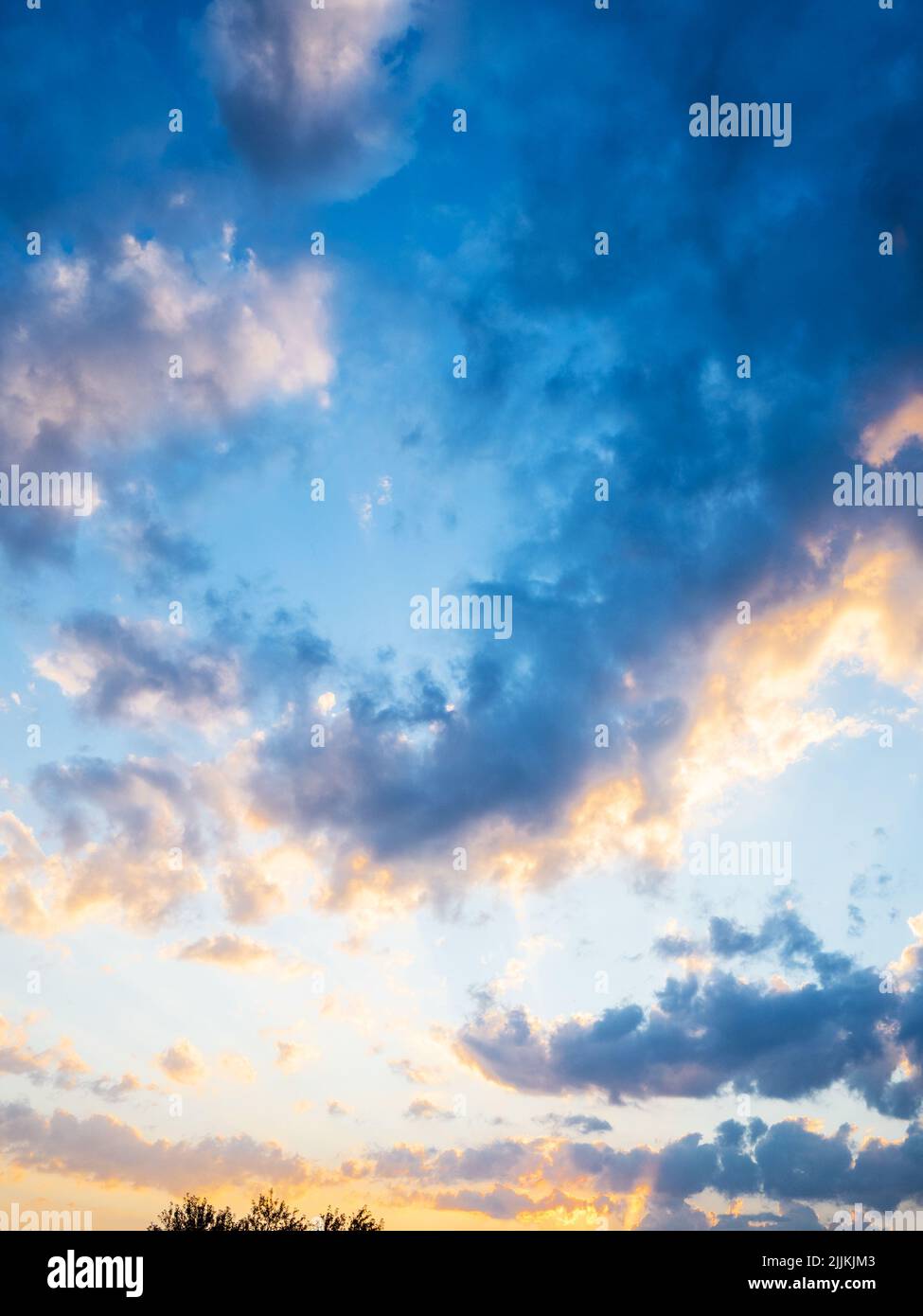 Outdoors in a blue sky with clouds setting hi-res stock photography and ...