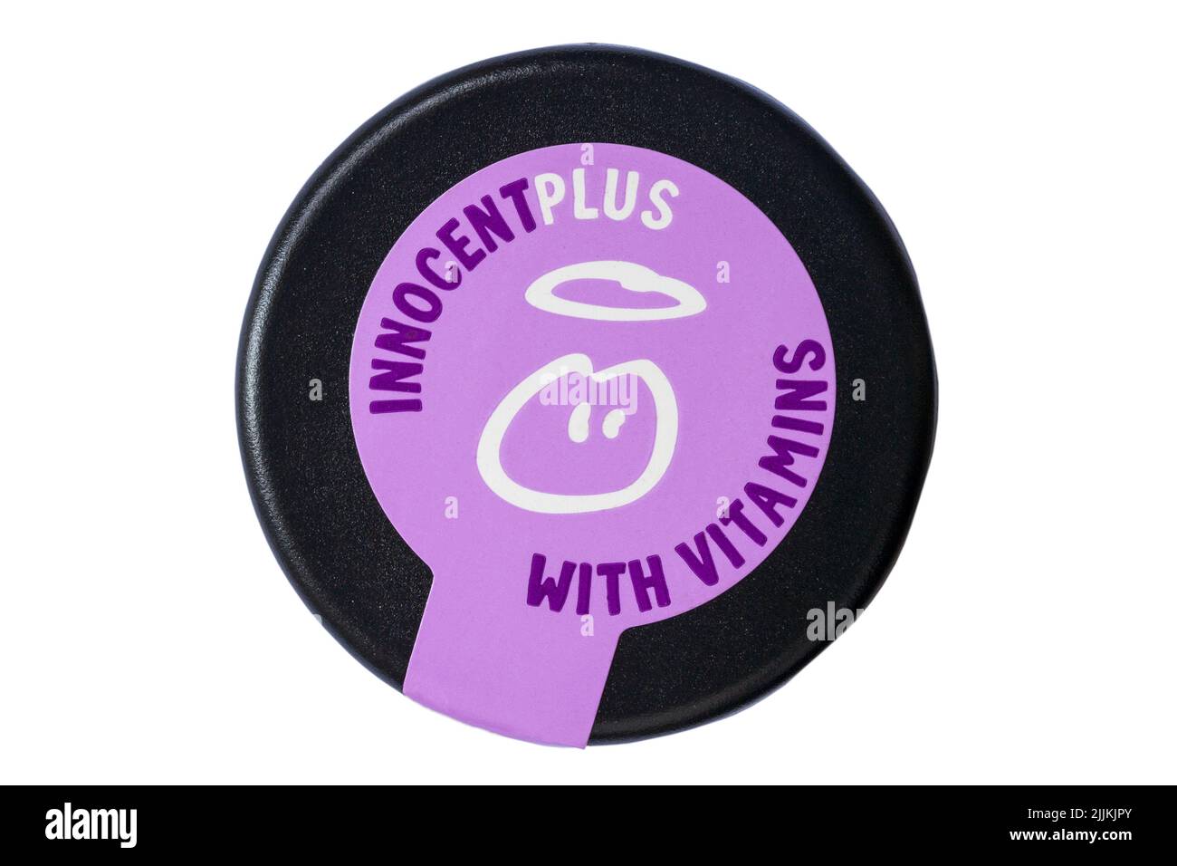 Looking down on bottle of Innocent Power to the Purple pomegranate ...