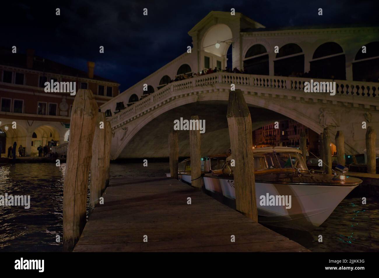 The historic Rialto Bridge at night in Venice, Italy Stock Photo - Alamy