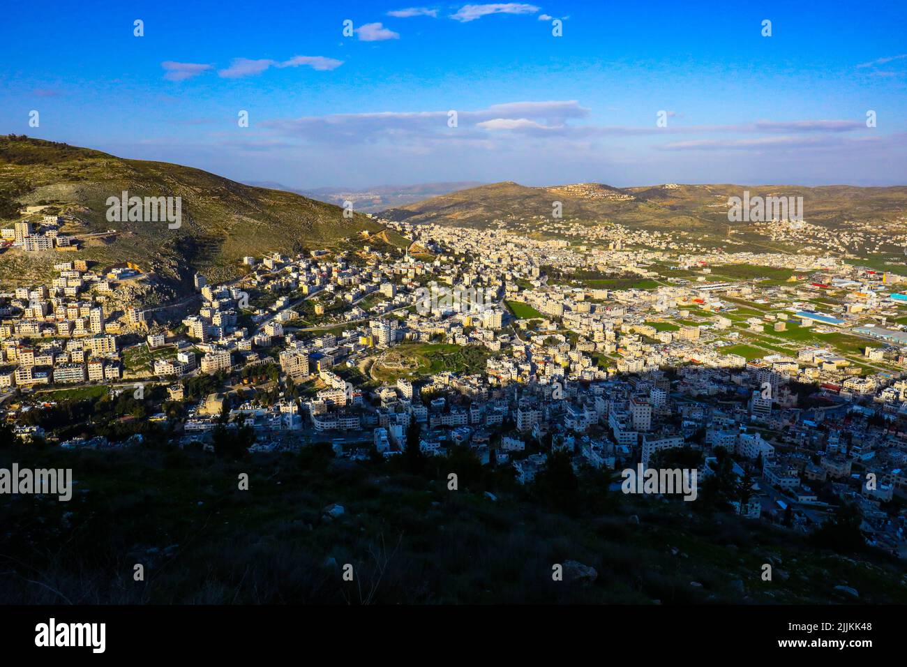 An aerial view of the village in Jerusalem, Israel under a cloudy sky ...