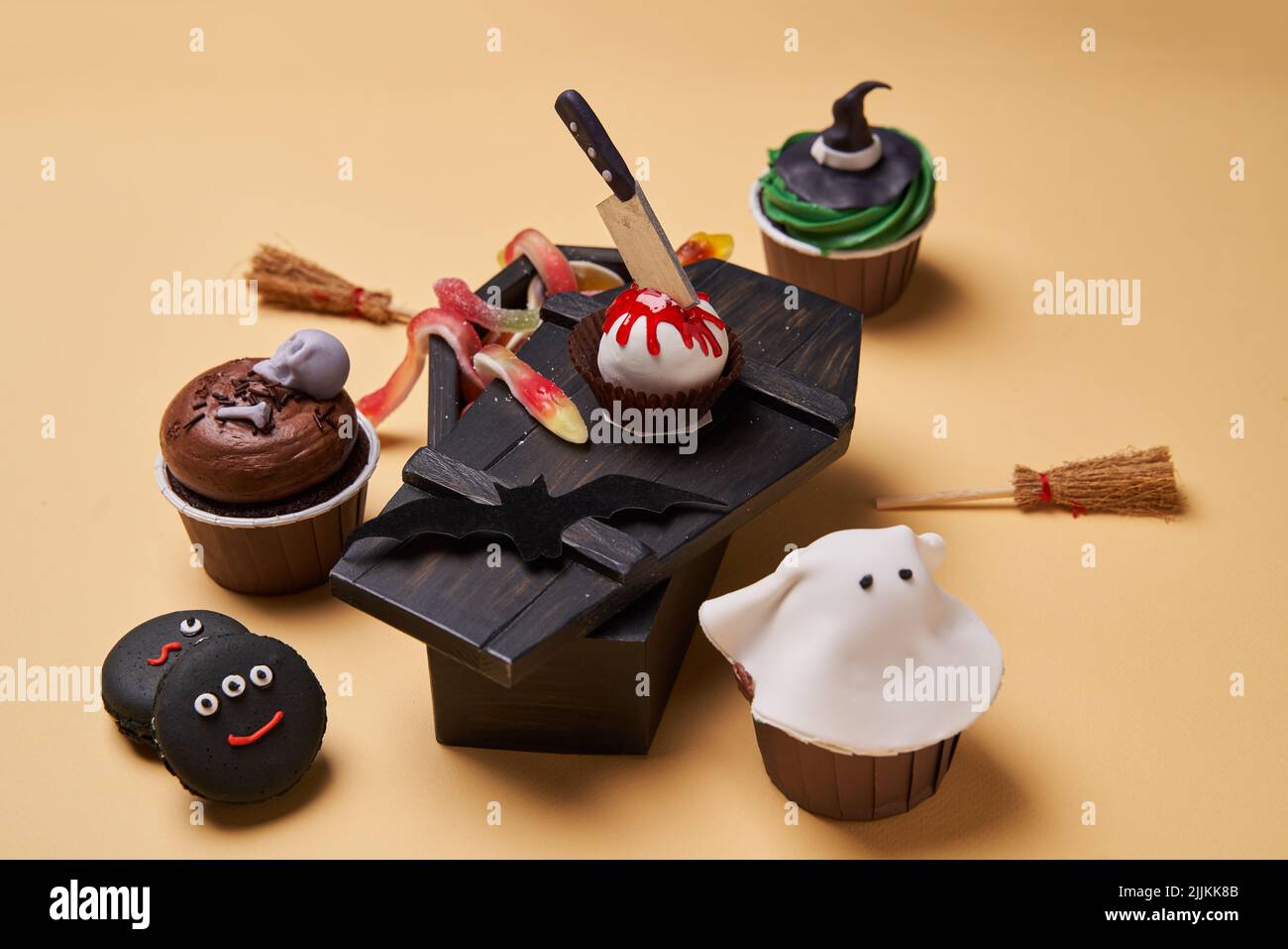 Macarons and muffins decorated for monsters, skeleton, ghost and witch ...