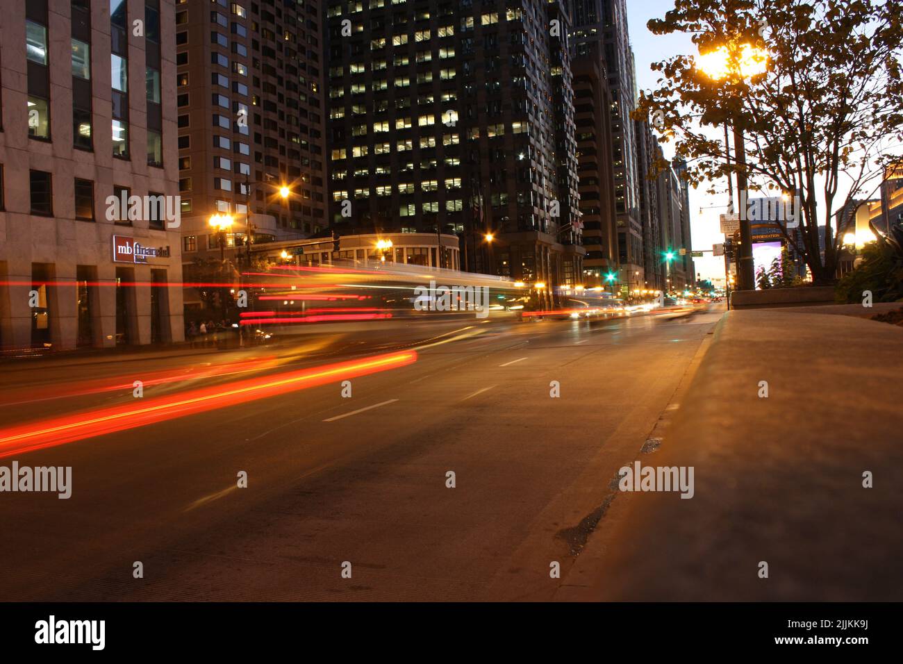 A long exposure of the traffic lights against skyscrapers in Chicago ...