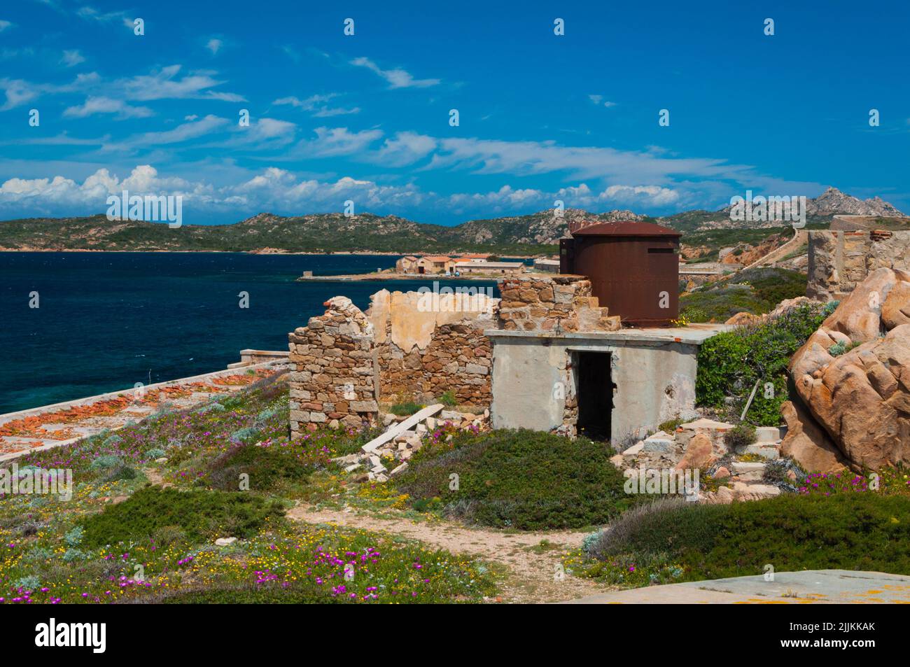 a photo of old stone building on a seashore Stock Photo - Alamy