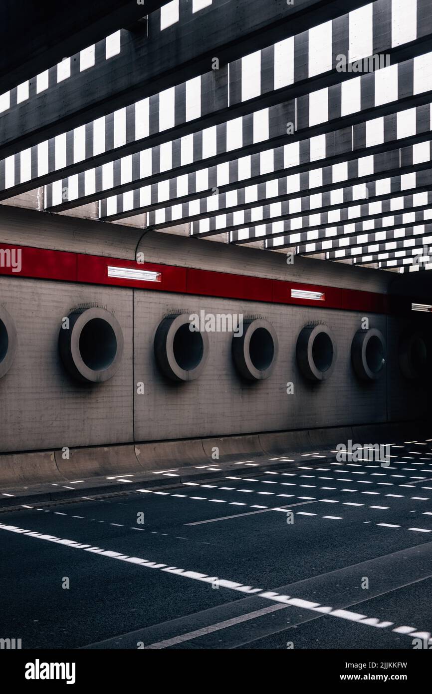 An interior underground wall with symmetric round holes and light ...