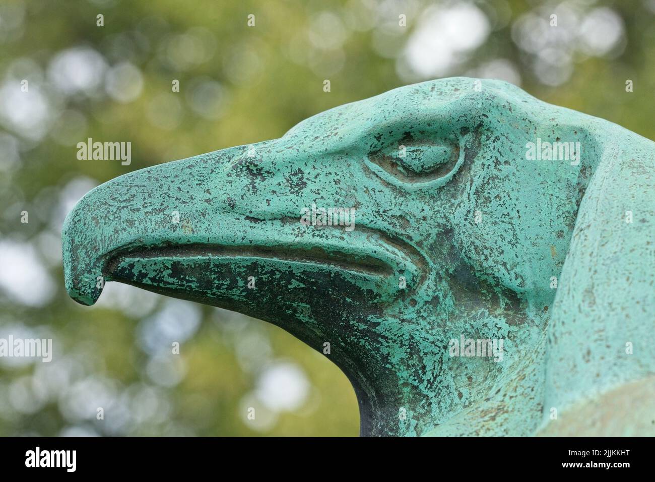 Closeup of a eagle head on a statue Stock Photo - Alamy