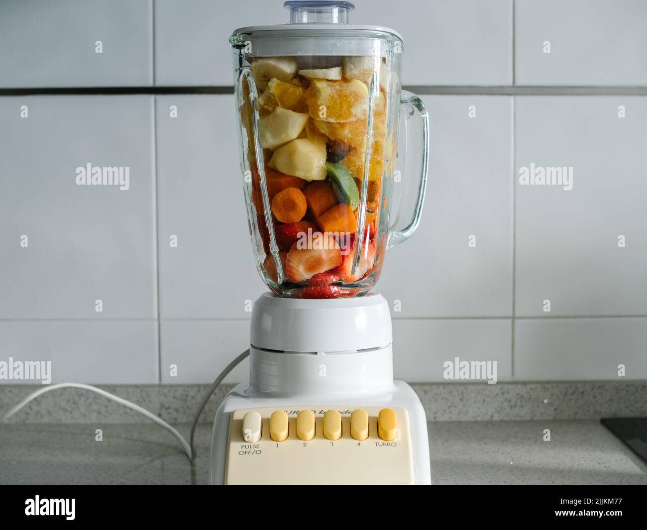 Concept: healthy food. Fruit inside a blender to make a smoothie Stock ...