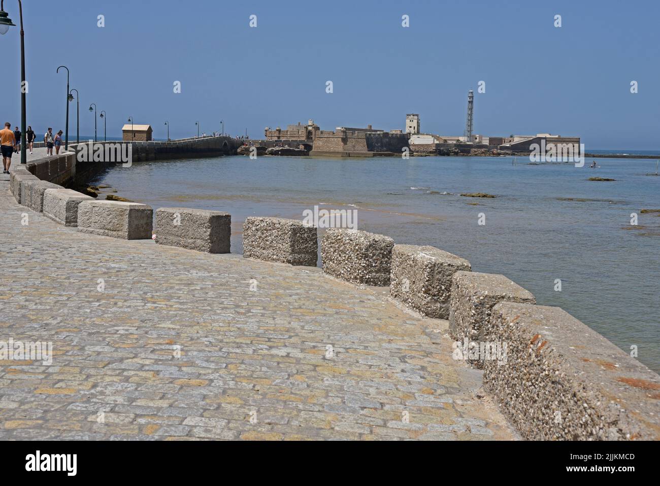 Walking path to the Castle Of San Sebastian in Cadiz Stock Photo - Alamy