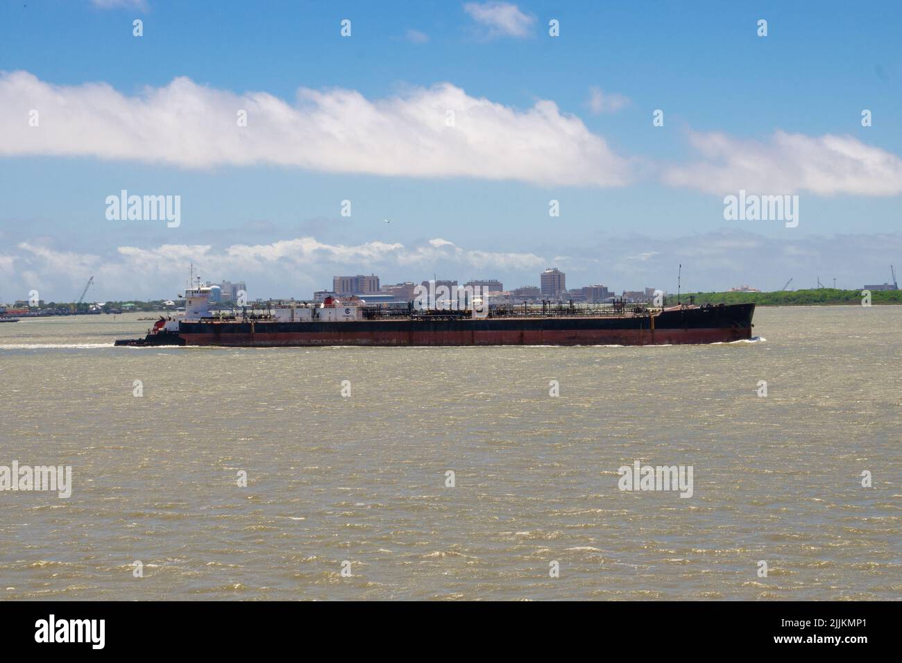 Tanker push barge navigating in Houston ship channel. Push tug, pushing ...