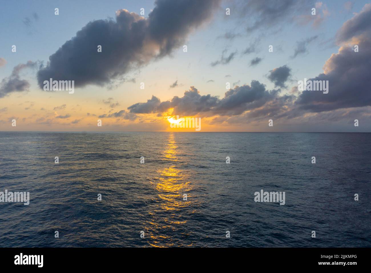 Sunrise in South Atlantic ocean during calm seas Stock Photo - Alamy