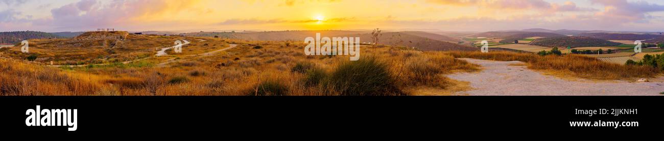 Sunrise panorama of the ancient ruins of Tel Lachish, countryside and ...