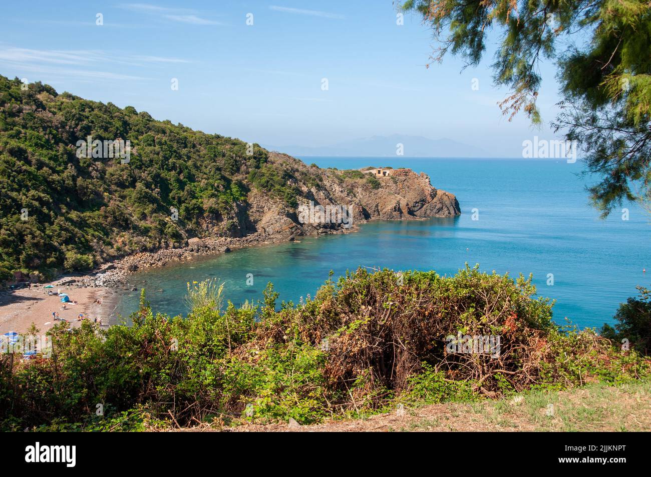 A view of sunny beach and cliff Stock Photo - Alamy