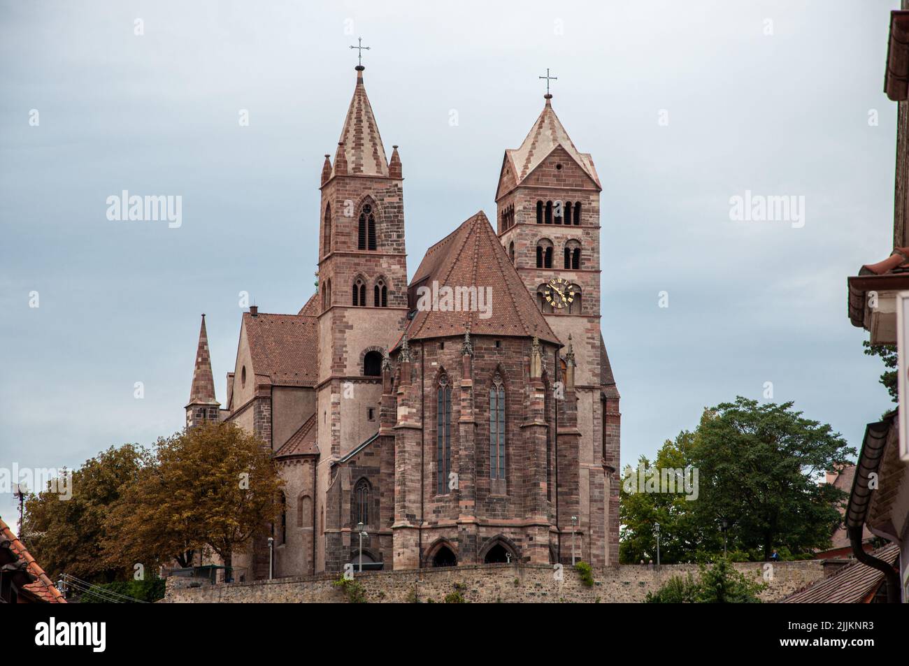 A scenic view of an old church in Breisach, Germany on cloudy sky ...