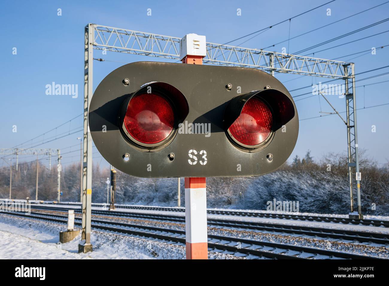 Level crossing signals on railway crossing in Rogow village in Brzeziny ...