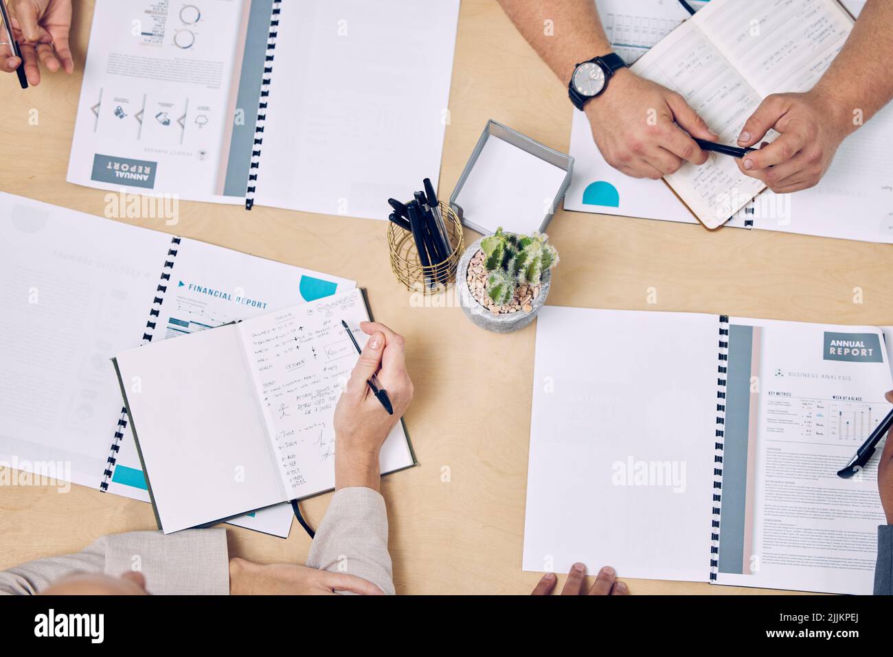 Information is key in achieving success. High angle shot of a group of ...