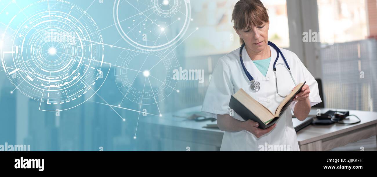 Female doctor reading a textbook in medical office; panoramic banner ...