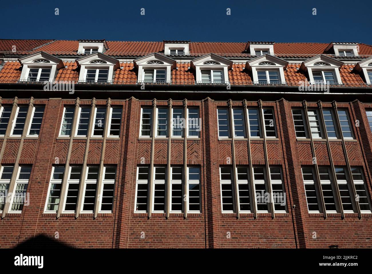 The exterior view of the red brick building Stock Photo - Alamy