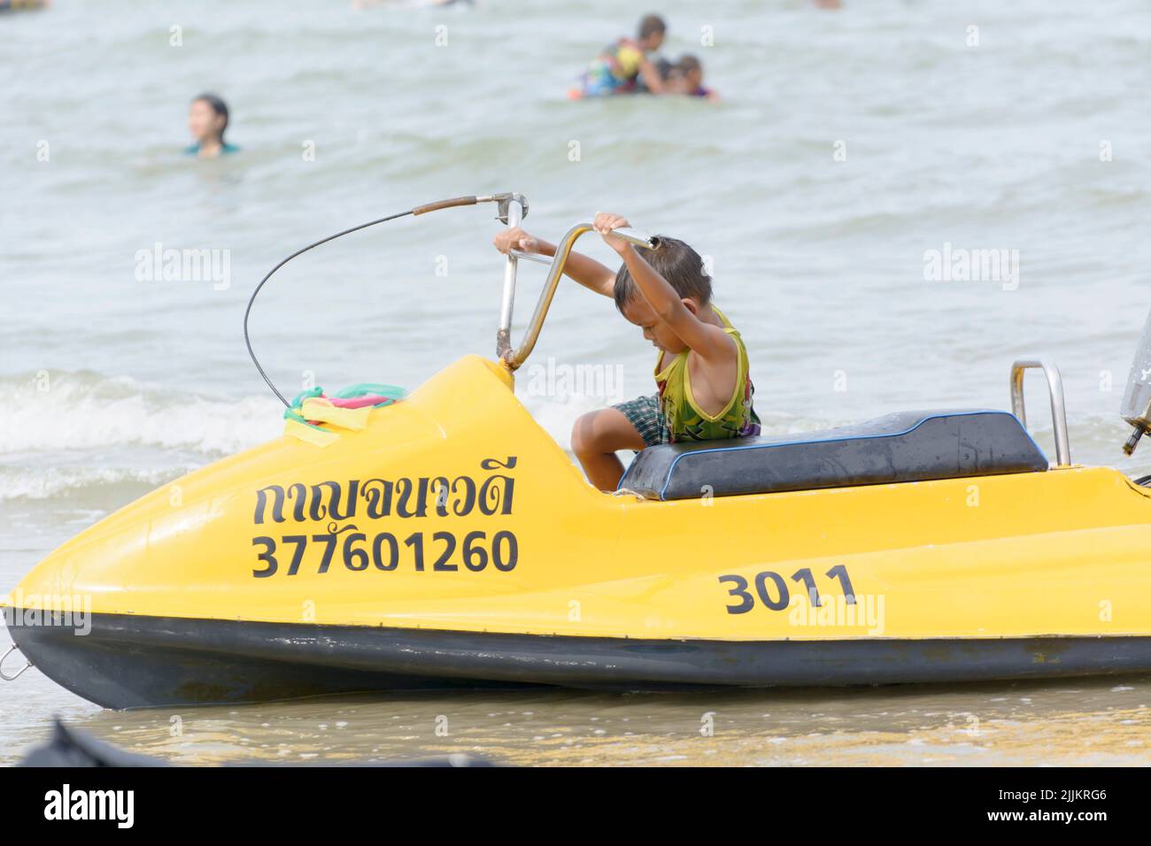 The Children with Jet Ski on the beach in Thailand Stock Photo - Alamy