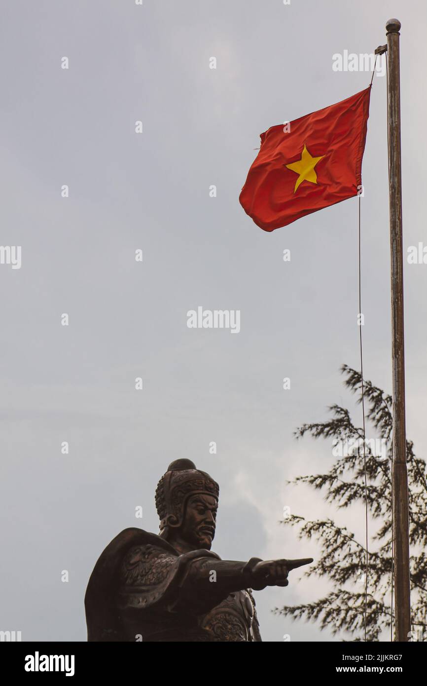 The Tamerlane Statue next to Vietnamese flag Stock Photo - Alamy