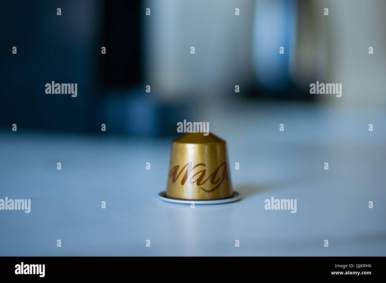 The Nespresso coffee capsule in the blurred background, Hoznayo, Spain ...