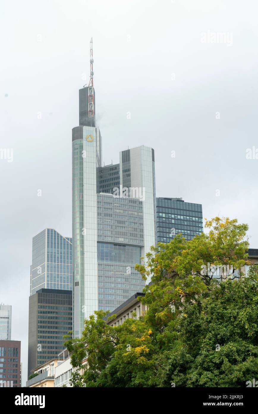 A vertical shot of tall modern skyscrapers in downtown Frankfurt ...