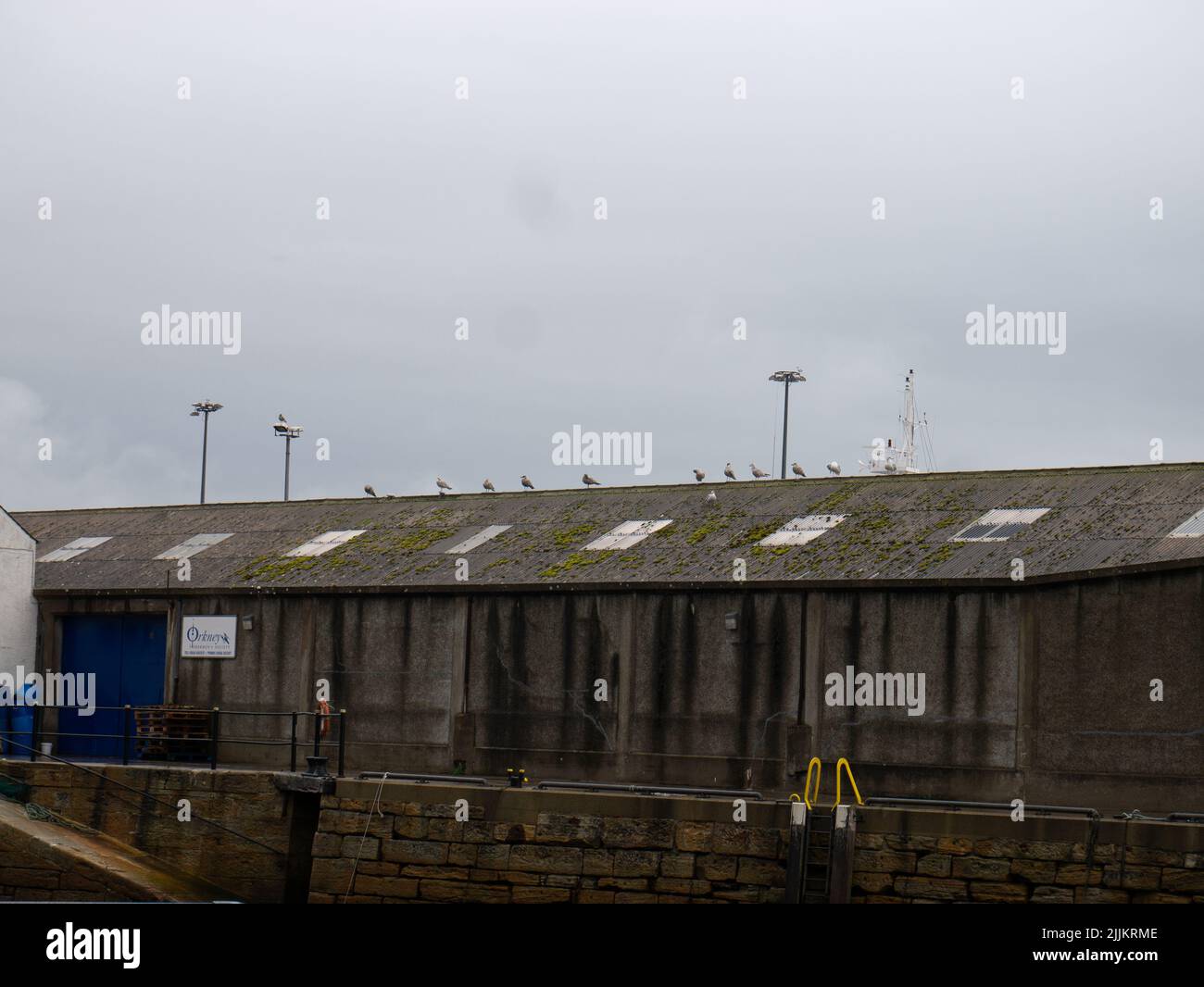 The exterior of an old building on a gloomy day. Snapshots from around ...