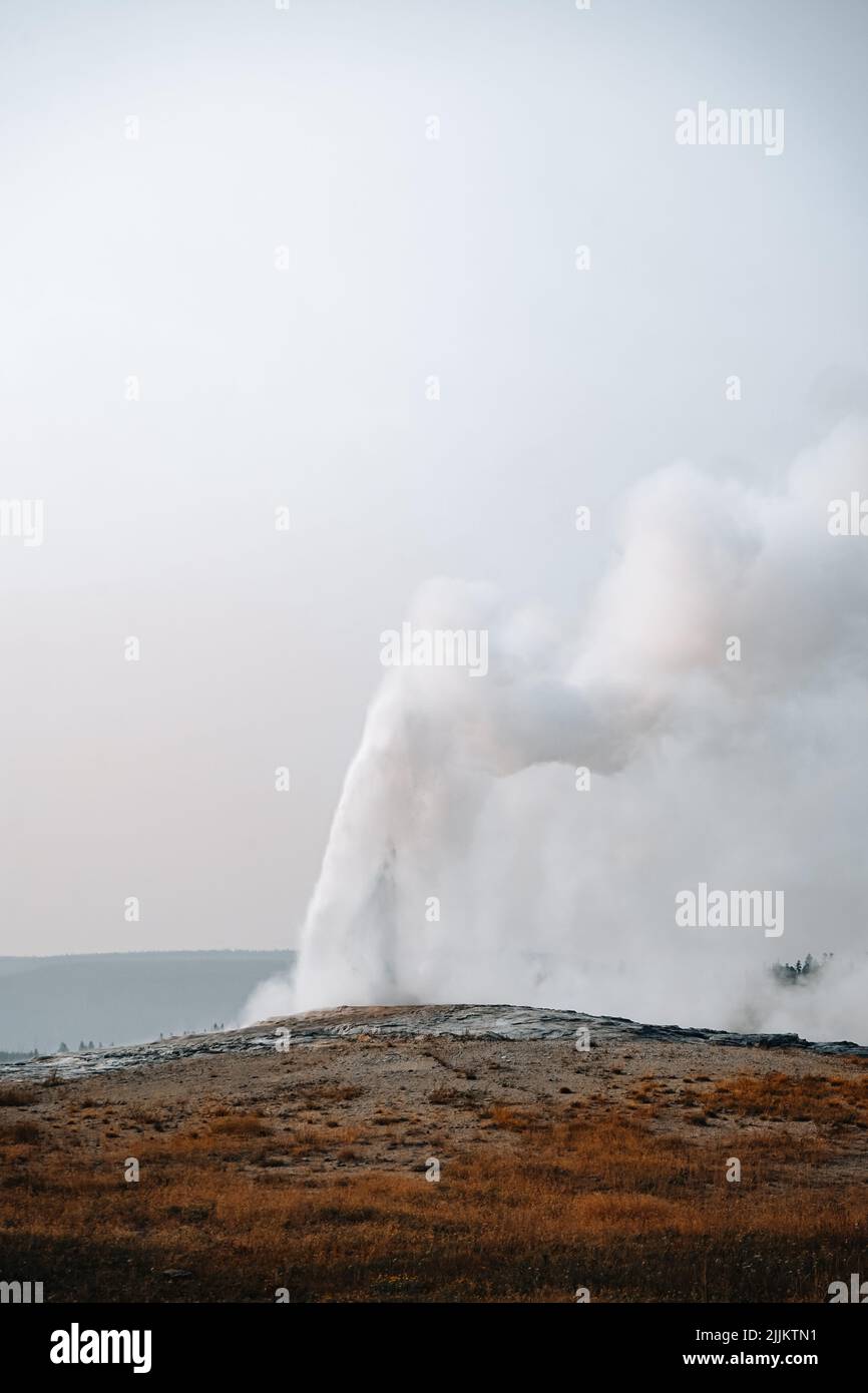 A beautiful view of a geyser at Yellowstone National Park Stock Photo ...