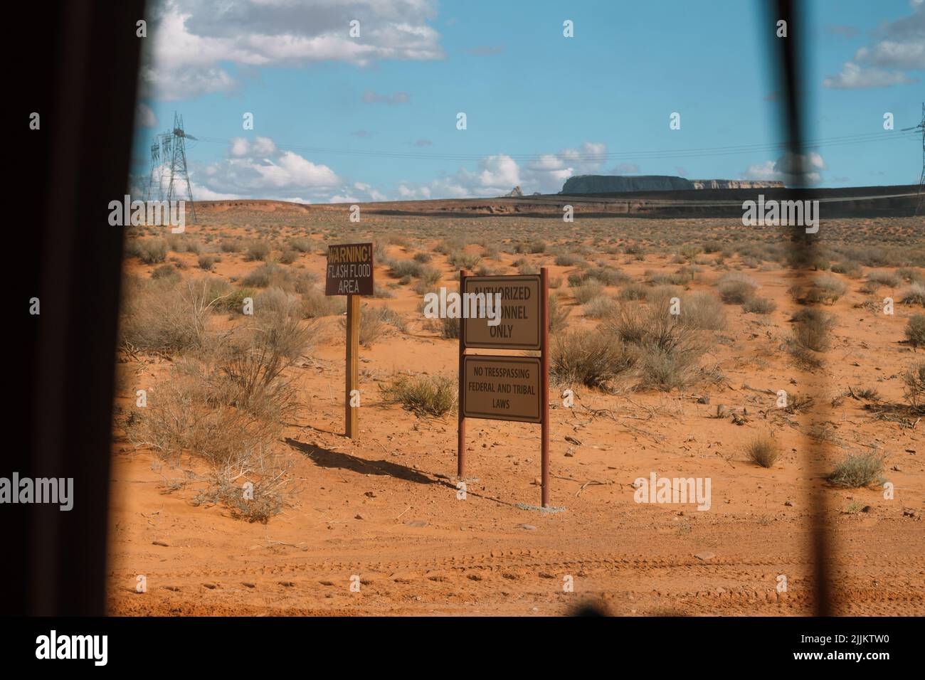Road signs with 'authorized personnel only' at the entry of Navajo ...