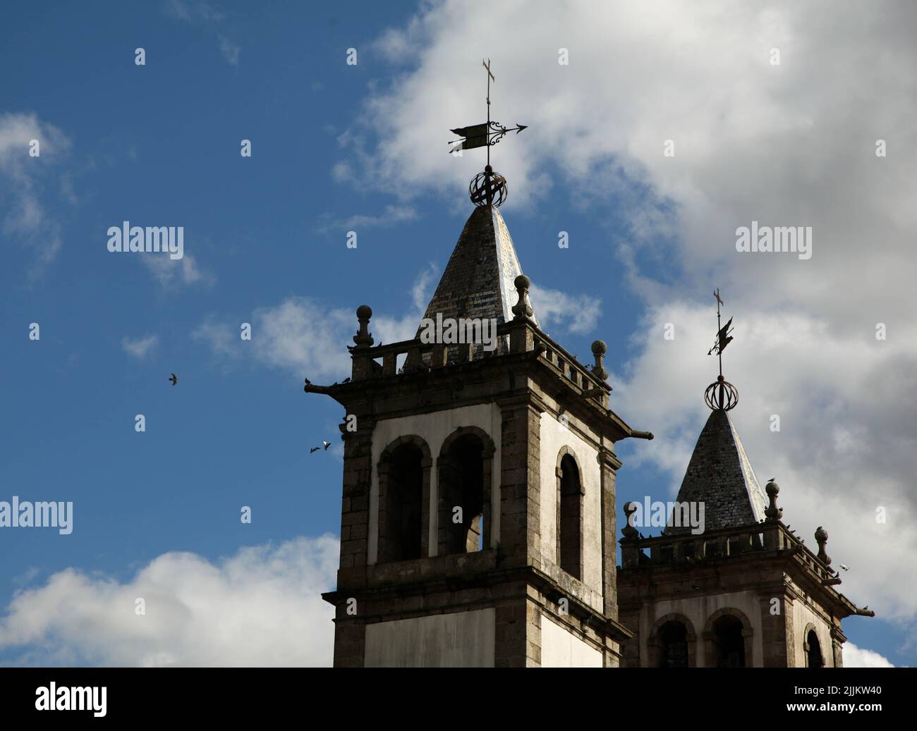 A beautiful shot of monastery bell towers on the sky background Stock ...