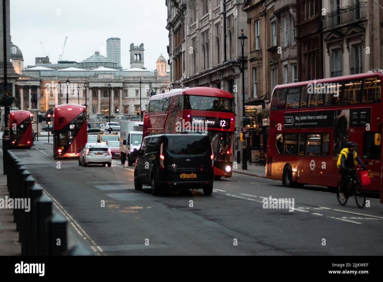 A shot of London double decker buses in the afternoon Stock Photo - Alamy