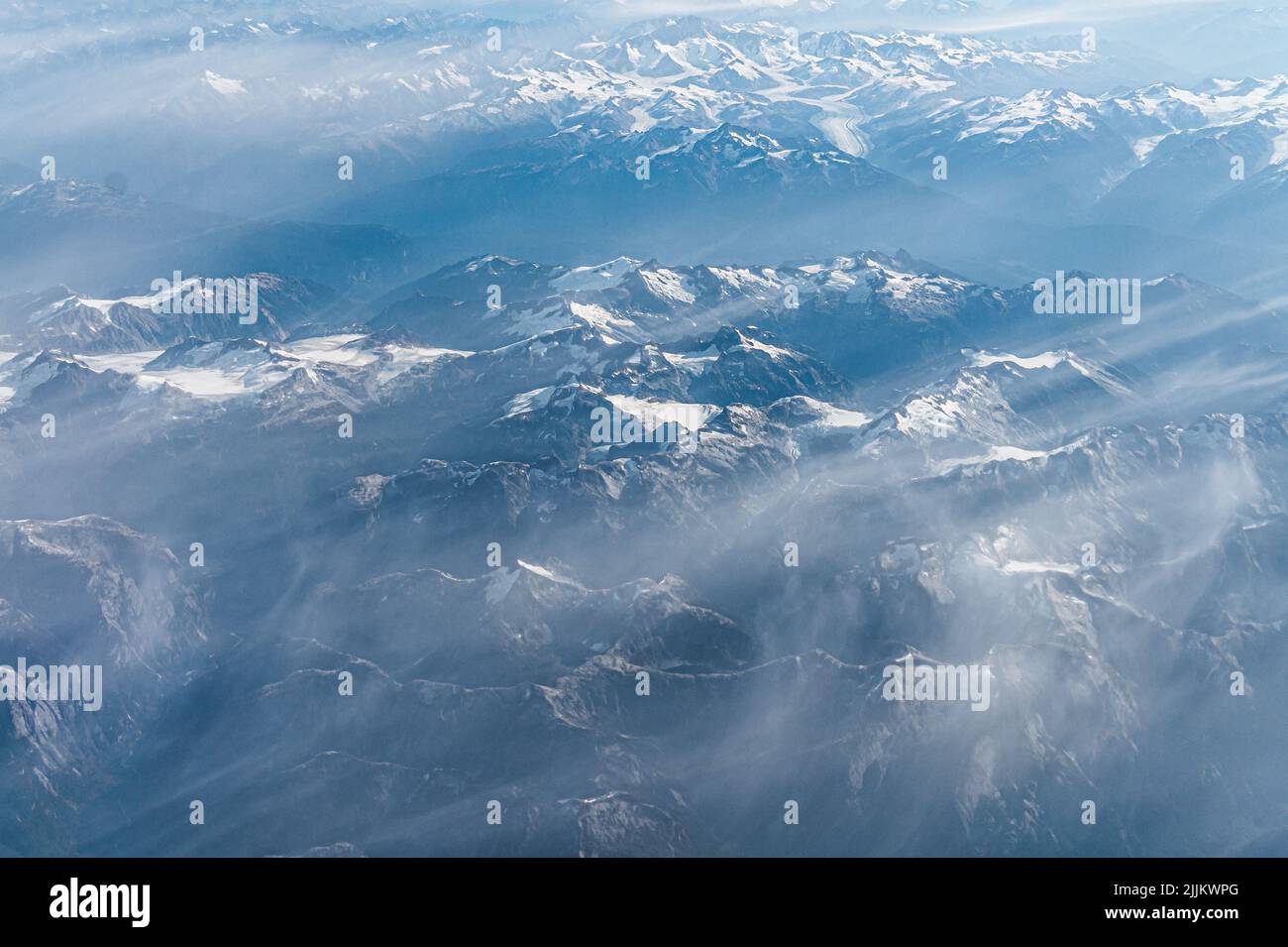 The beautiful aerial landscape with mountains. View from a plane in BC ...