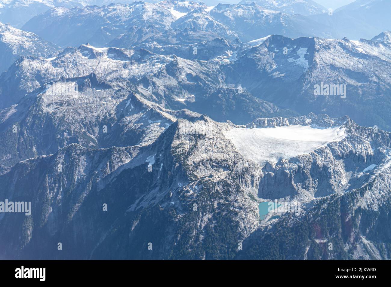 The beautiful aerial landscape with mountains. View from a plane in BC ...