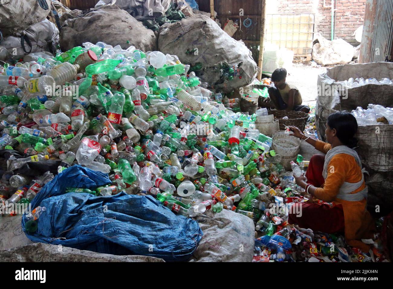 Works Work in a plastic bottle recycling factory in Dhaka, Bangladesh ... Works Work in a plastic bottle recycling factory in Dhaka, Bangladesh ...