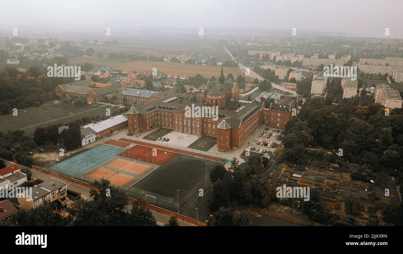 An aerial view of a palace surrounded by fields and trees Stock Photo ...
