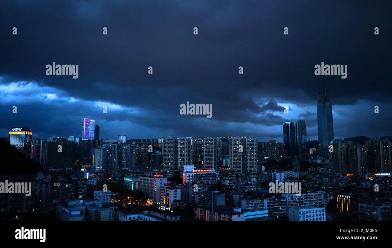 GUIYANG, CHINA - JULY 27, 2022 - A thunderstorm over the city before ...