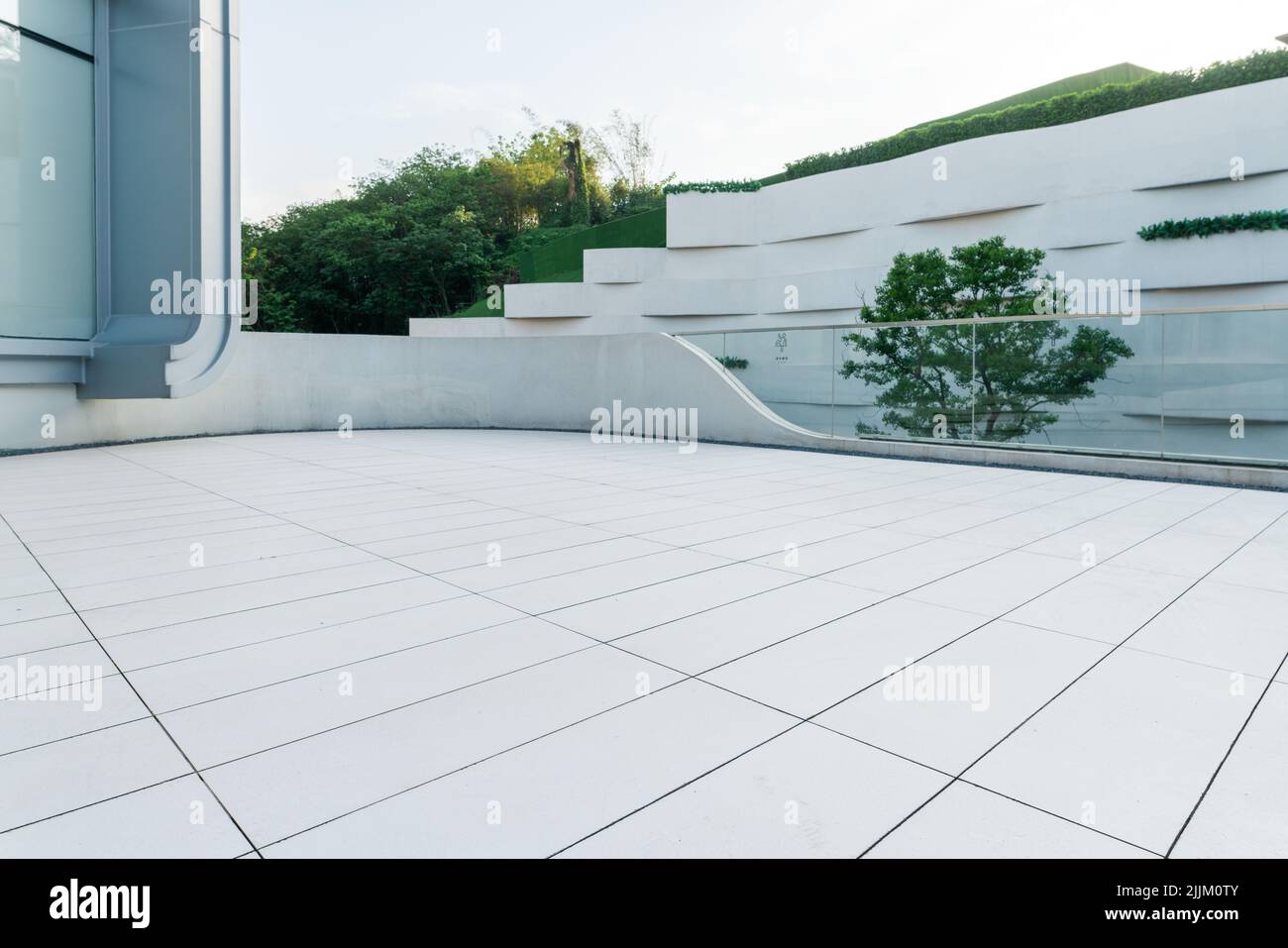 A empty ground floor in front of modern office building exterior Stock ...