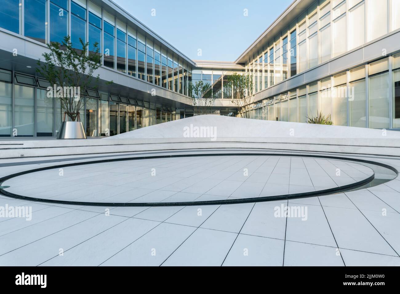 A empty ground floor in front of modern office building exterior Stock ...