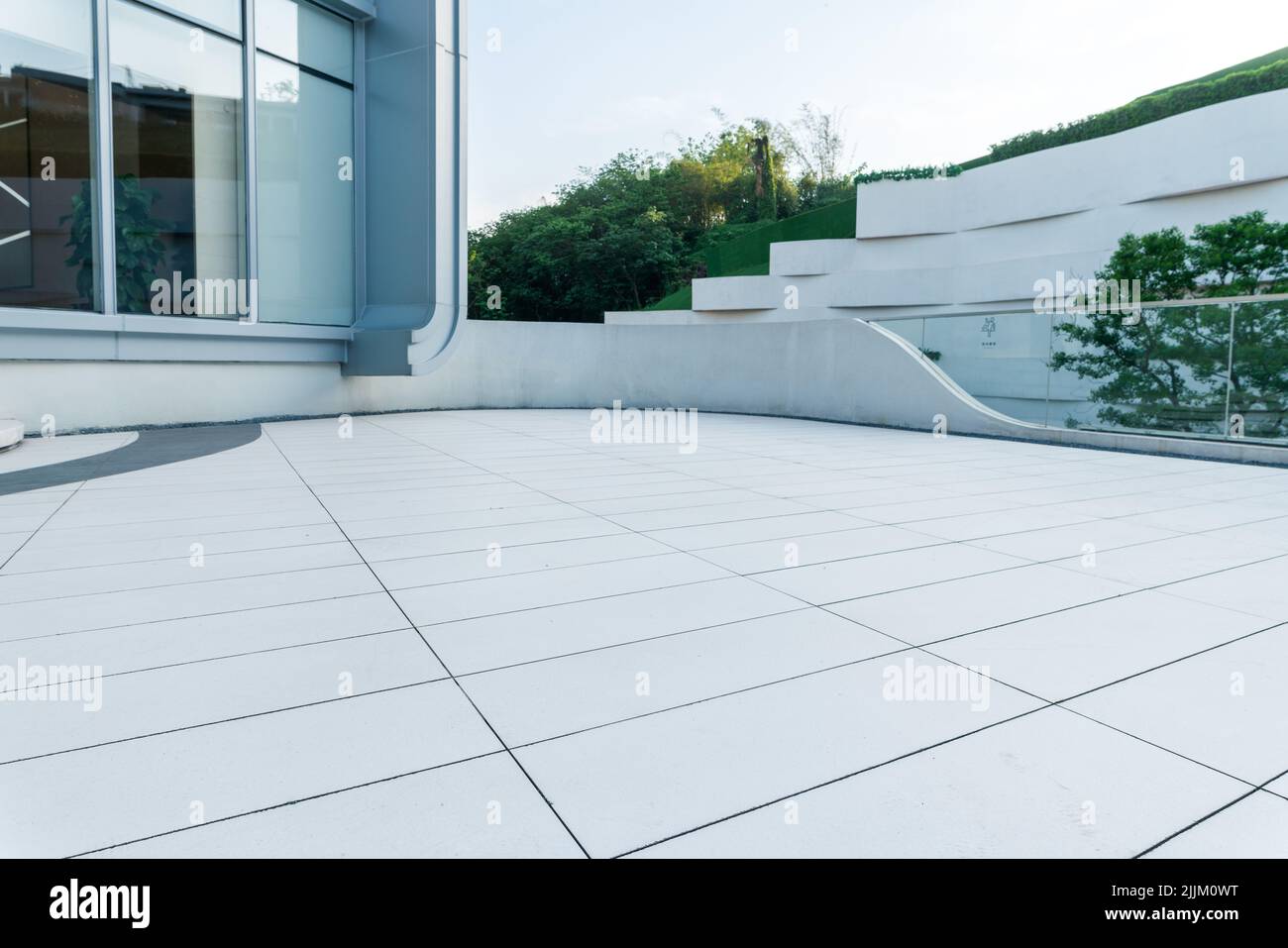 A empty ground floor in front of modern office building exterior Stock ...