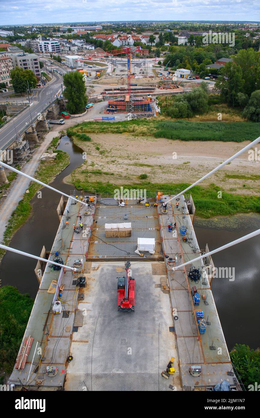 Magdeburg, Germany. 27th July, 2022. Cladding tubes lead from the ...
